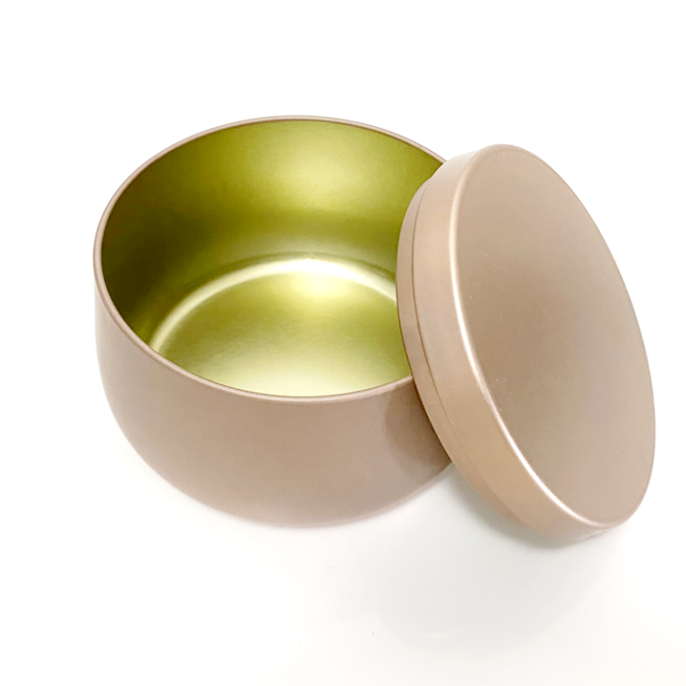 Round colored metal candle jar